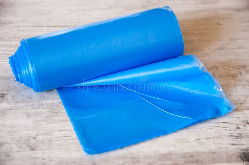 Blue Roll of Modern Toilet Paper on a Blue Background. a Paper Product ...