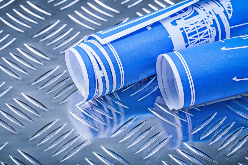 Rolled Engineering Drawings on Grooved Metal Sheet Top View Cons Stock ...