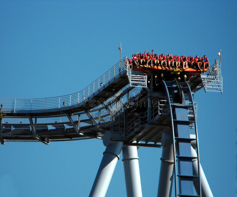 Blue Roller Coaster with People Stock Photo - Image of curve, track ...