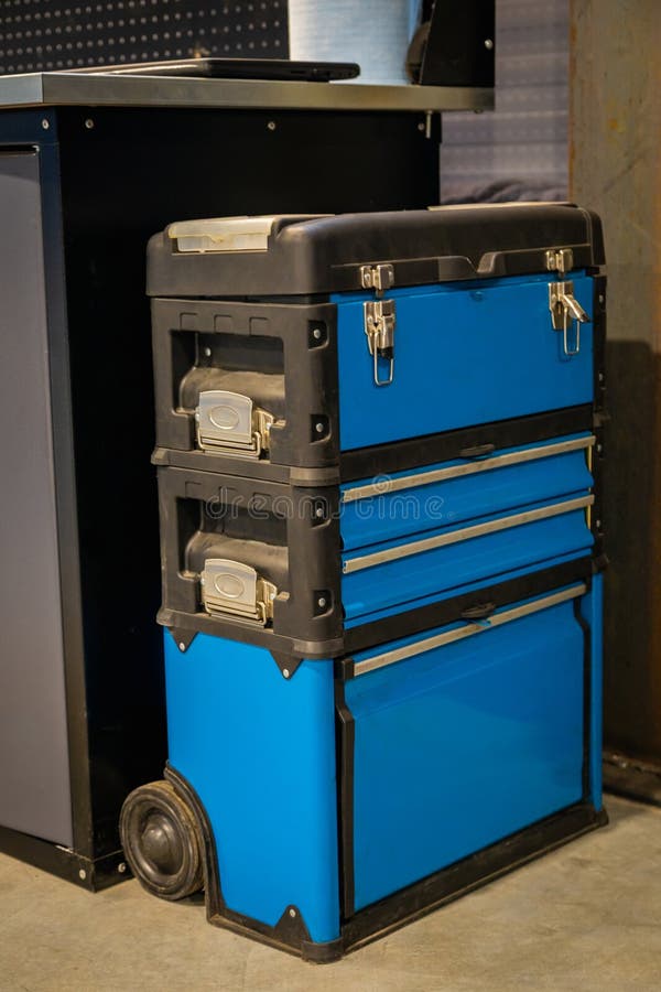 Blue Rolling Tool Box with Drawers and Compartments Standing in ...