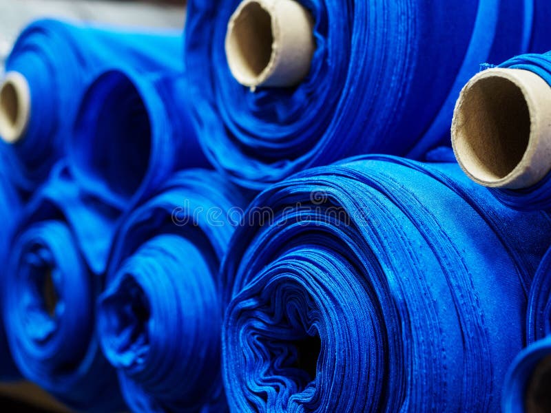Blue Rolls of Knitted Fabric. Classic Blue Color Stock Image - Image of ...