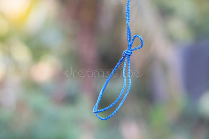 Blue Rope Hanging Loop. Concept, Tying Rope Knots in daily Life Stock ...