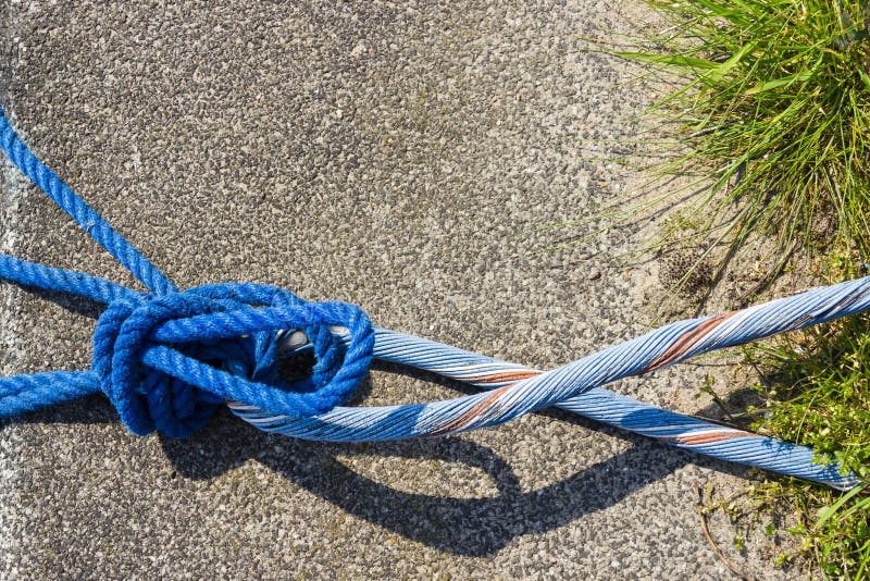 Blue Rope and Knot on Asphalt Stock Image - Image of rope, network ...