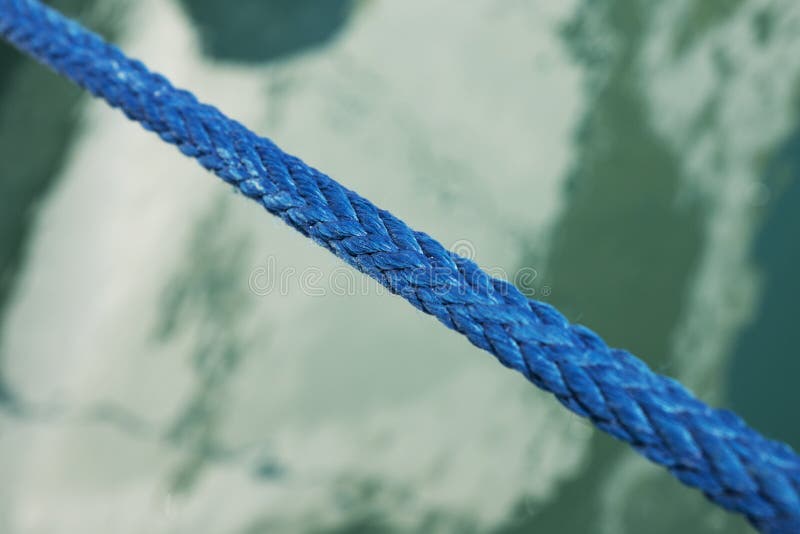 The blue ropes over water stock photo. Image of ropes - 86344874