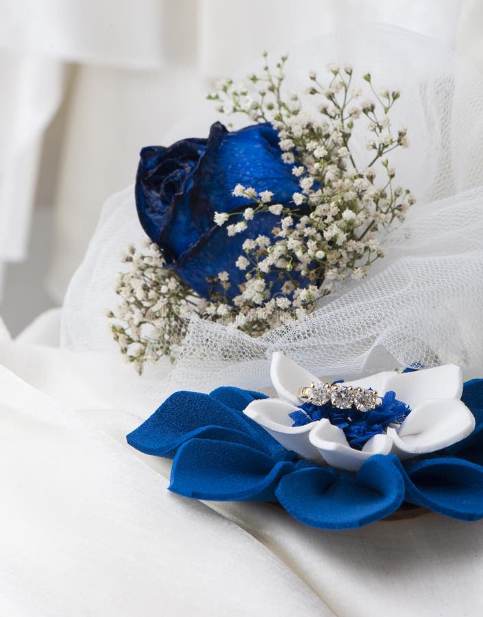 A Blue Roses and Wedding Rings Stock Image - Image of honeymoon ...