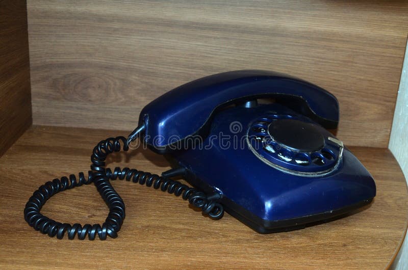 Old Blue Rotary Telephone on a Brown Background Stock Image - Image of ...