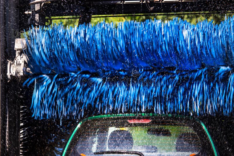 Blue Rotating Brushes in Automatic Car Washing Stock Image - Image of ...