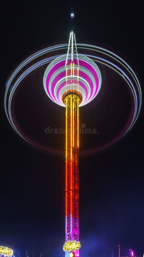 Blue Rotating Funfair Ride at Night, Light Trails, Long Exposure ...