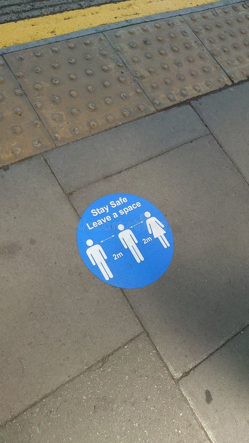 Blue Round Sticker on the Ground with the Writing Stay Safe. Leave a ...
