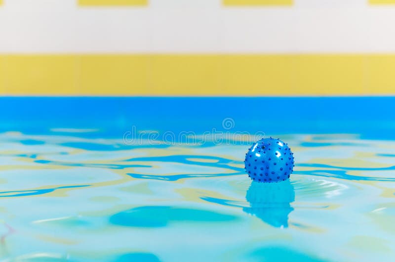 Blue Rubber Ball Floating in the Pool Stock Photo - Image of round ...