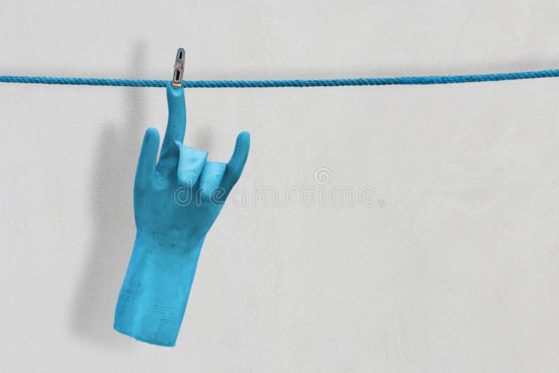The Blue Rubber Gloves are Hanging on the Plastic String with White ...