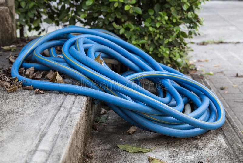 Blue rubber tube stock image. Image of accessory, bend - 61641939