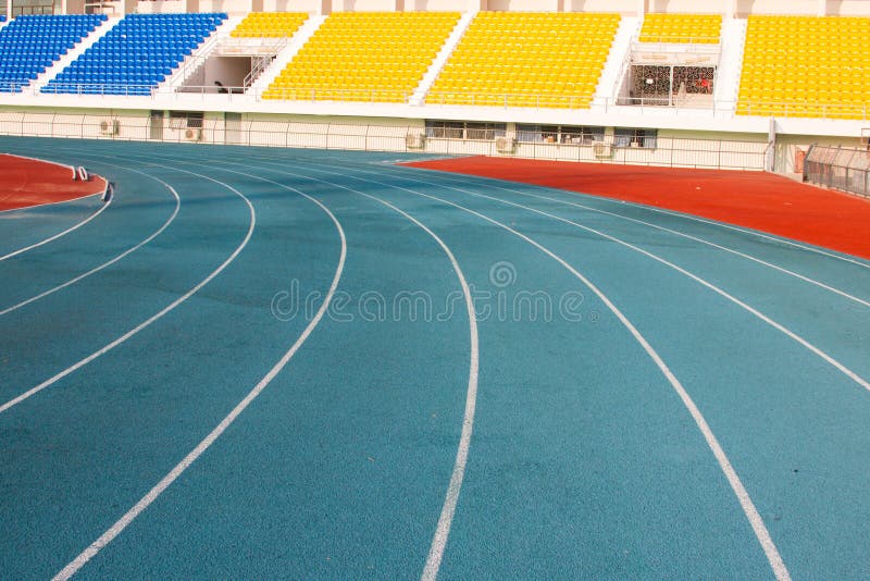 Blue running track stock image. Image of blocks, exercise - 33440183