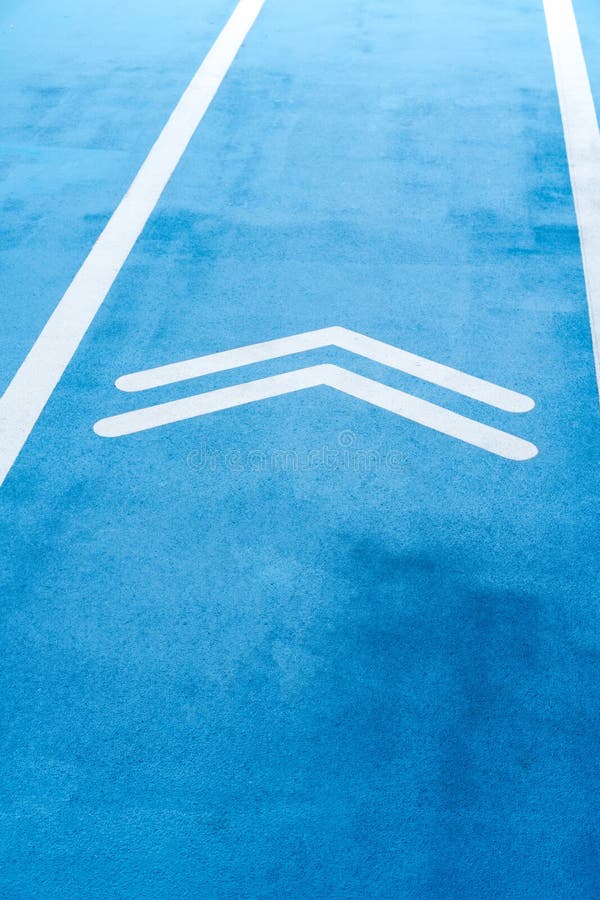 Blue Running Track with Double Arrows Symbol Stock Photo - Image of ...