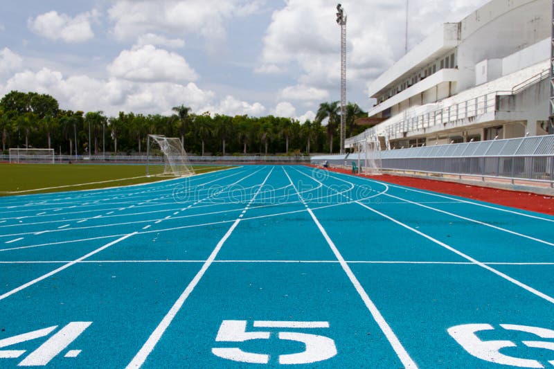Blue running track stock image. Image of blocks, exercise - 33440183