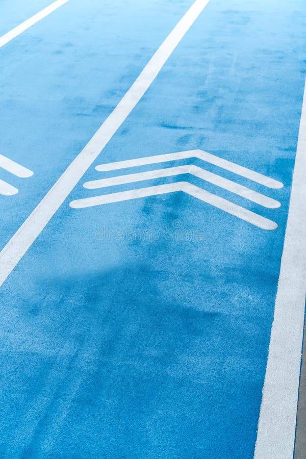 Blue Running Track with Thiplet Arrows Symbol Stock Photo - Image of ...