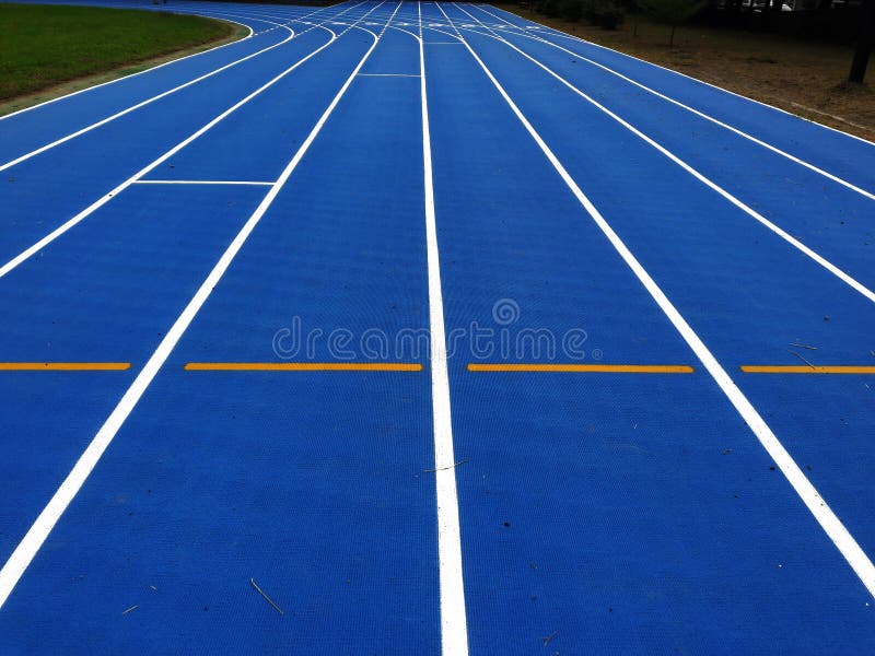 Blue Runway. the Start and End of the Stadium Track Stock Photo - Image ...