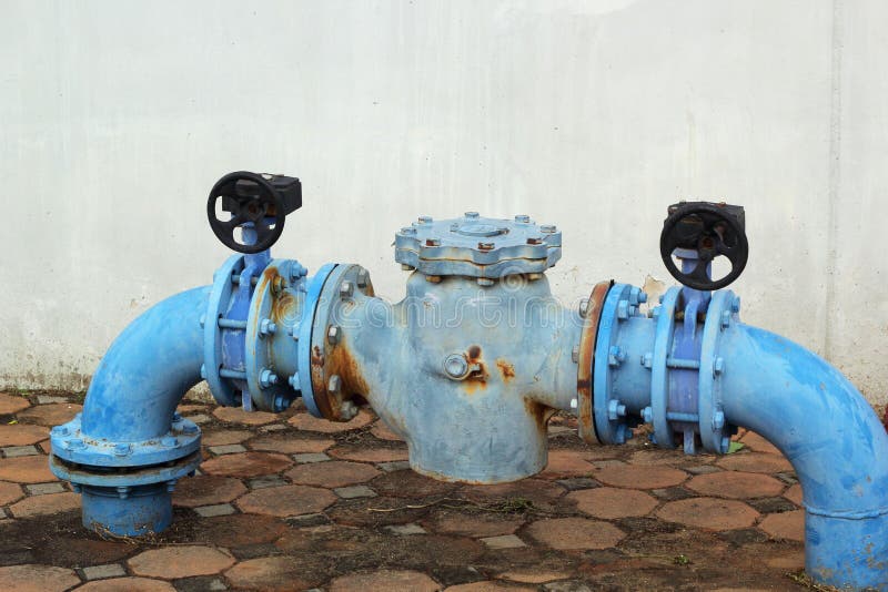 Blue Rusty Metal Industrial Water Pipes with a Valve. Stock Photo ...