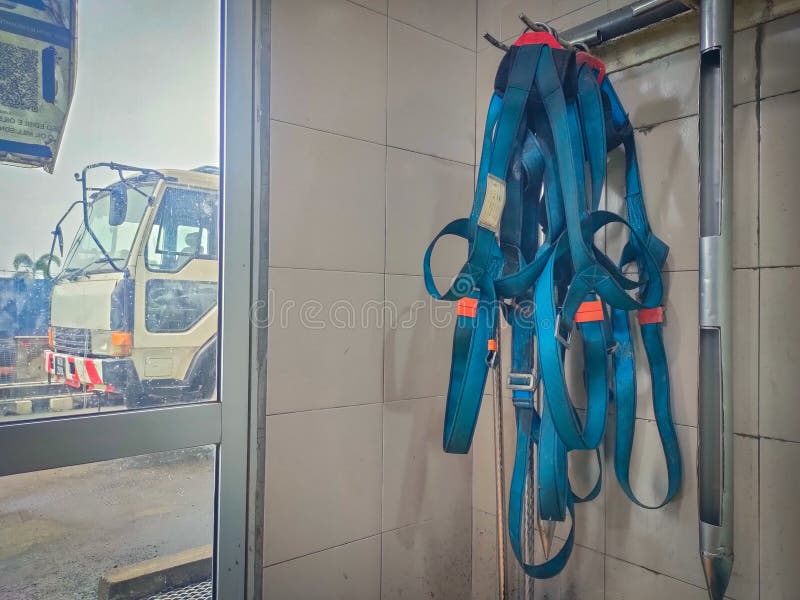 A Blue Safety Harness is Hung Next To the Sample Taking Equipment Stock ...