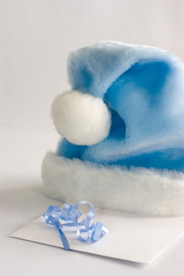Blue Santa hat stock photo. Image of delicate, wishes, gift - 322496