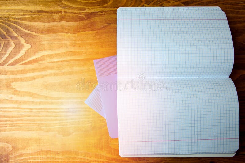 Blue School Notebooks on a Wooden Table with Text Space Stock Image ...
