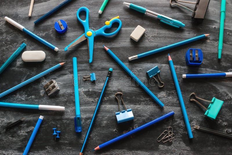 Blue School Supplies on a Blackboard Stock Image - Image of supply ...