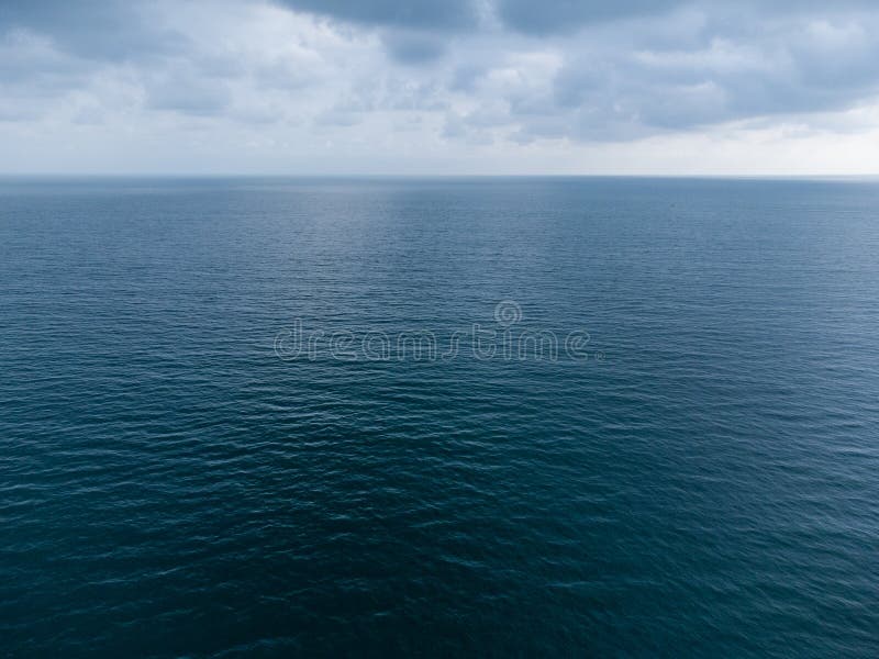 Blue Sea Aerial Top Down View with Dramatic Sky Stock Photo - Image of ...
