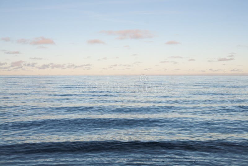 Blue Sea and Calm Waves at Sunset Stock Photo - Image of calm, seascape ...
