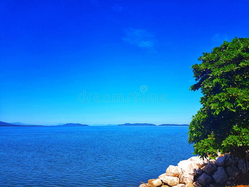 Blue sea deep three stone stock image. Image of deep - 157369819