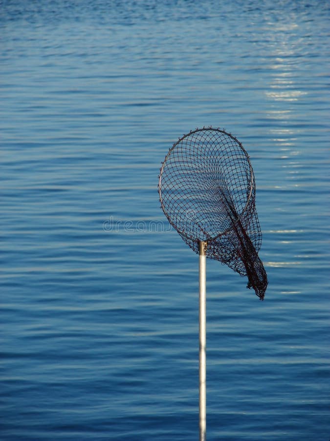 Blue sea and fishing net stock image. Image of background - 9895783
