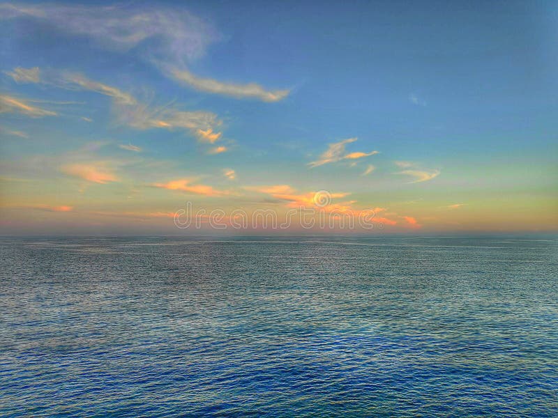 Blue sea horizon at sunset stock image. Image of clouds - 162748307 Blue sea horizon at sunset stock image. Image of clouds - 162748307