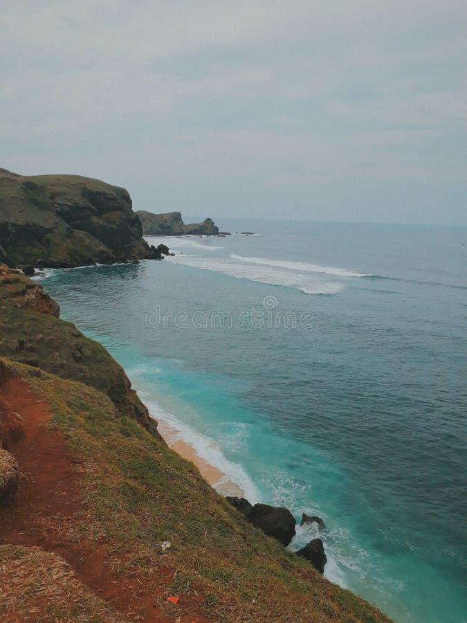 The Blue Sea and Overcast Sky Seen from the Hilltop Stock Photo - Image ...