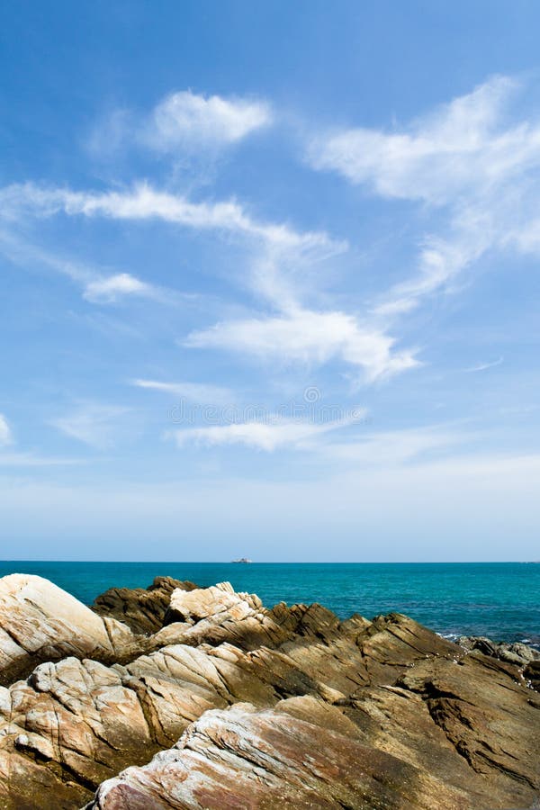 Blue sea and rocks stock image. Image of vivid, seascape - 25079881