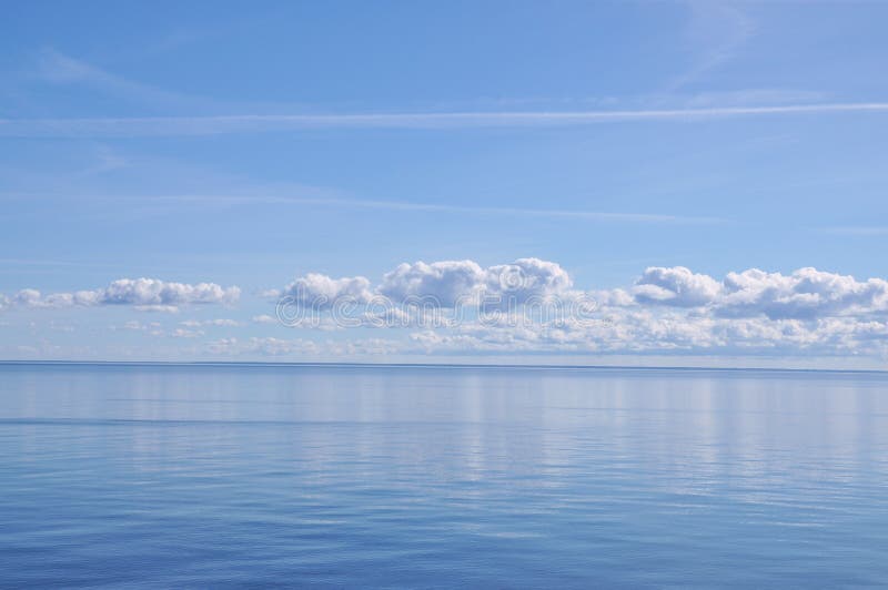 Sea and Blue Sky with Clouds Stock Image - Image of blue, sunnyday ...