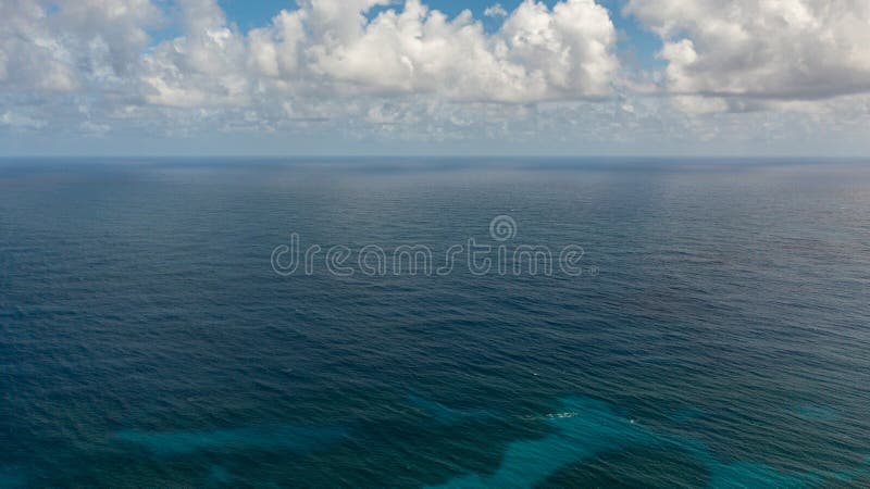 Blue Sea and Sky with Clouds. Stock Photo - Image of clouds, water ...