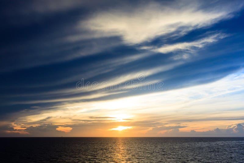 Blue Sea and Sky with Sun Red Light in the Middle Sea Stock Image ...