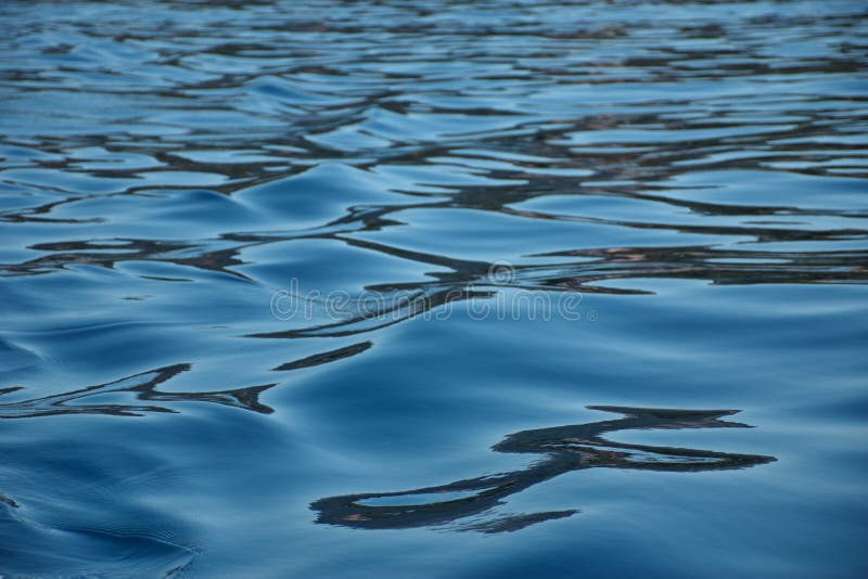 Blue sea surface stock photo. Image of motion, wave - 259328412