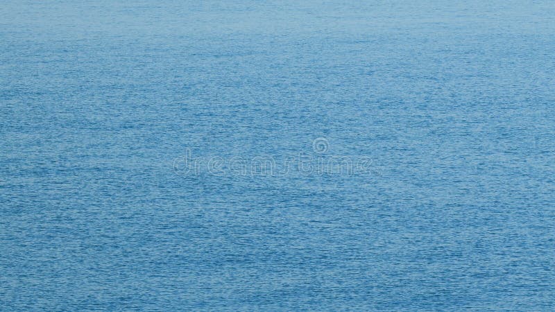 Blue Sea Water in Calm. Beautiful Wave Pattern in Sea. Still Calm Sea ...