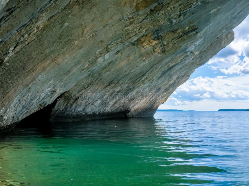 Blue Sea Water Surface and Cliffs Stock Image - Image of rock, coast ...