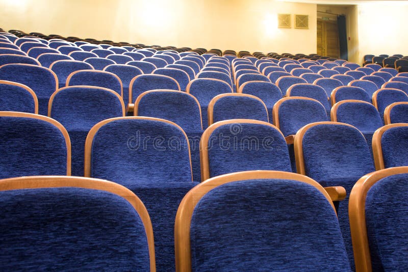 Blue seats in a theater stock image. Image of concert - 105528807