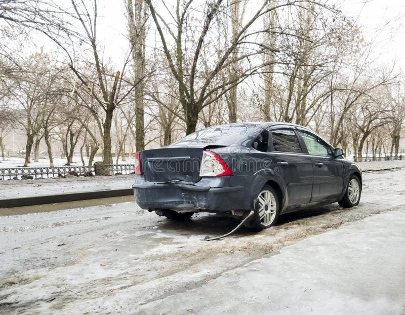 Sedan after an Accident with a Crumpled Trunk Stock Photo - Image of ...