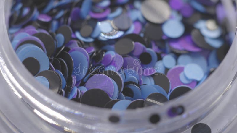 Blue Sequins in a Jar Rotate in a Circle Stock Footage - Video of ...