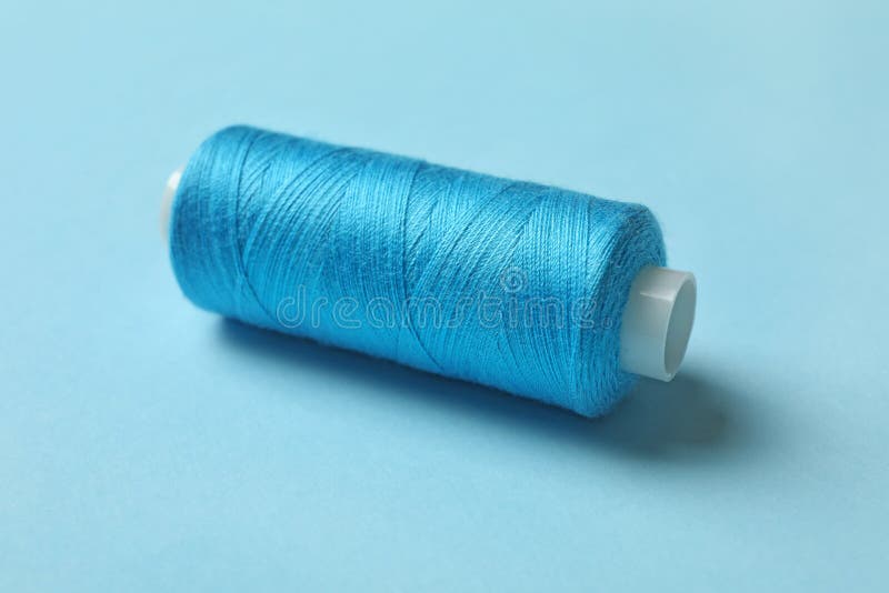 Blue Sewing Thread on Blue Background, Close Up Stock Photo - Image of ...
