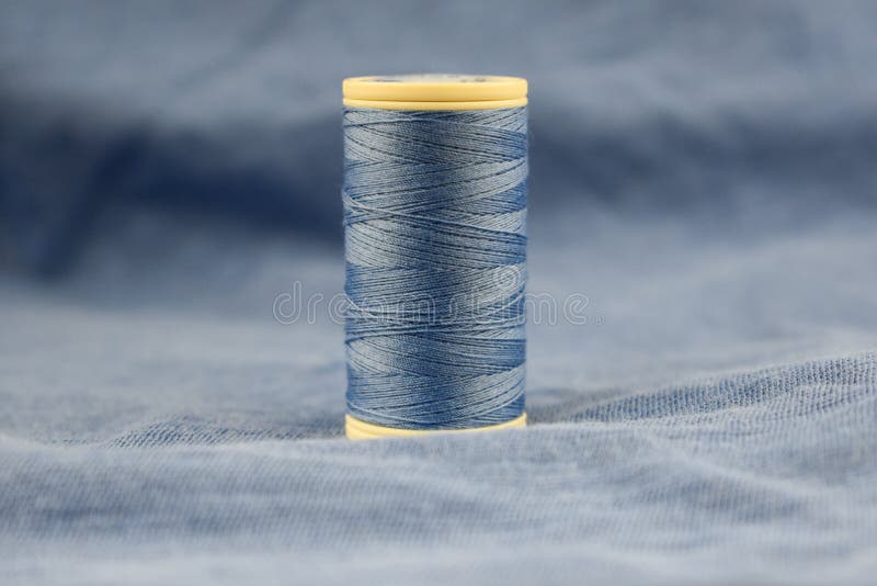 Blue Sewing Thread on Blue Fabric. Stock Image - Image of cotton ...