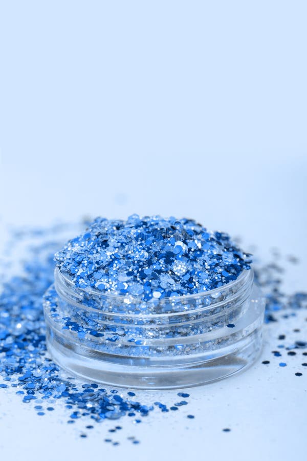 Blue Shimmer and Glitter in Small Plastic Box Stock Photo - Image of ...