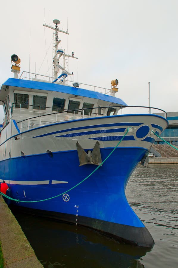 A Blue Ship Topside Dock Dock Lines and a Bollard Harbour ...