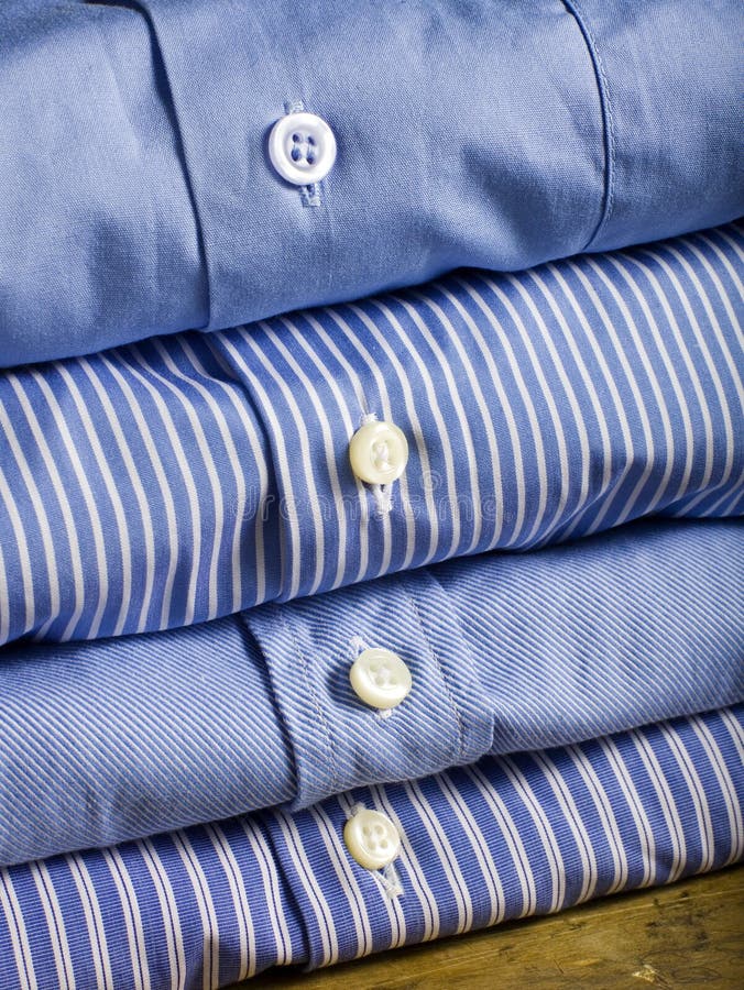 Blue shirts stock photo. Image of folded, color, garb - 6378000