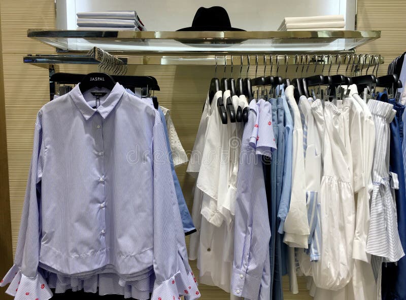 Blue shirts editorial photography. Image of long, rack - 96512082