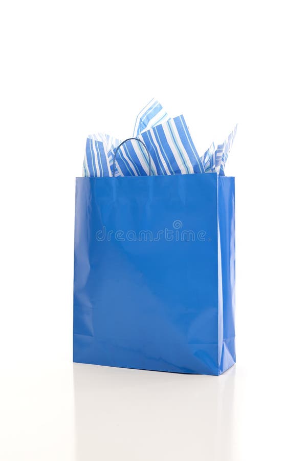 Blue shopping bag stock photo. Image of white, merchandise - 16897606
