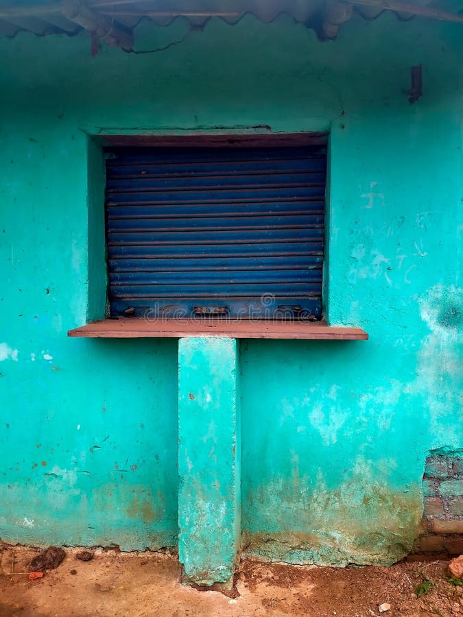 Blue shutter of the Shop. stock image. Image of yellow - 224968917